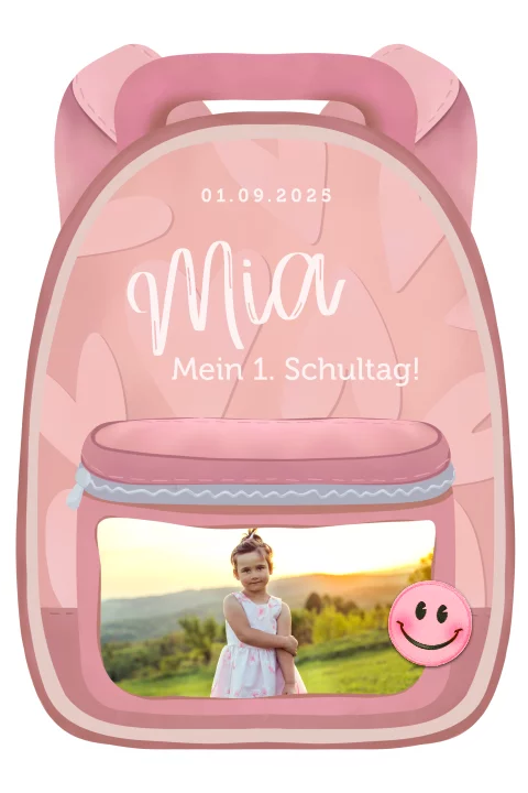 Einladung zur Einschulung als pinker Rucksack mit Smiley und Foto